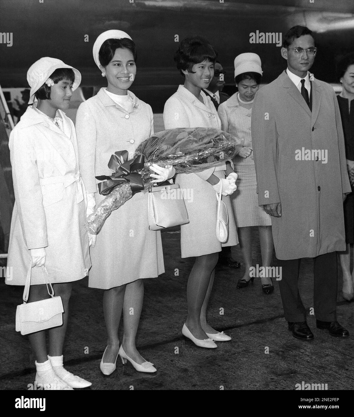 The King and Queen of Thailand and two of their three daughters, Princess Sirindhorn, 11, left ...