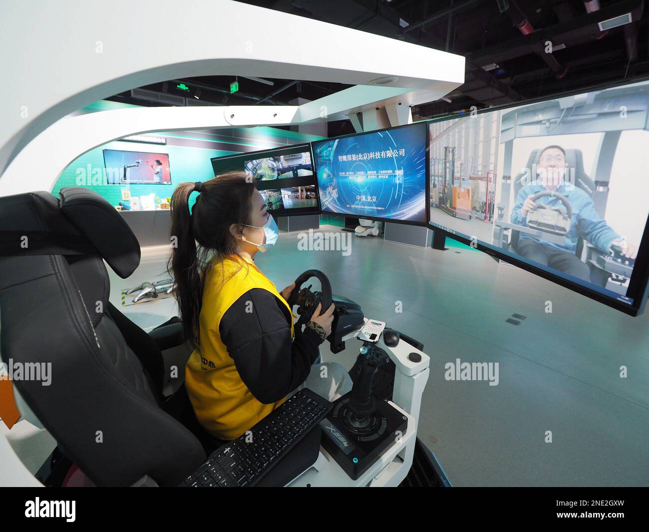 BEIJING, CHINA - FEBRUARY 16, 2023 - A staff member demonstrates "5G ...