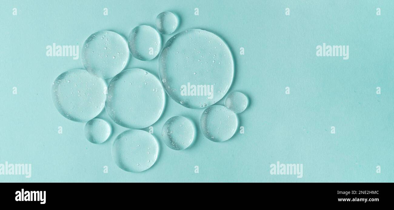 Cosmetic lotion transparent gel drops texture background, blue Stock ...