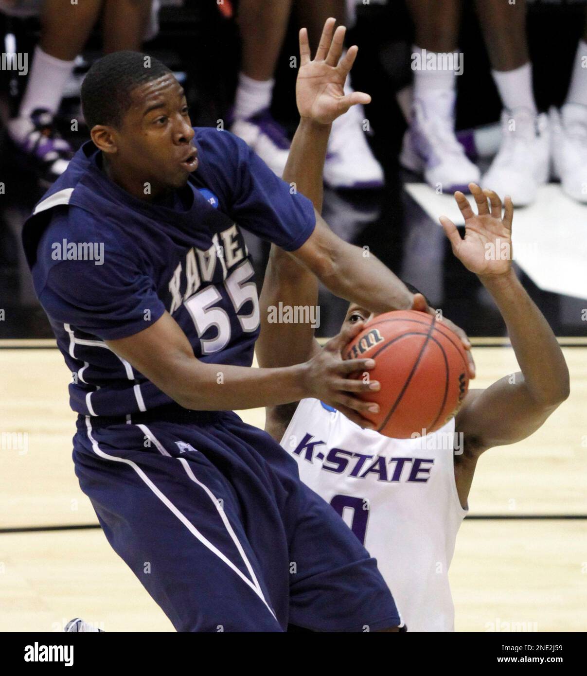 Xavier's Jordan Crawford (55) shoots as Kansas State's Jacob Pullen ...