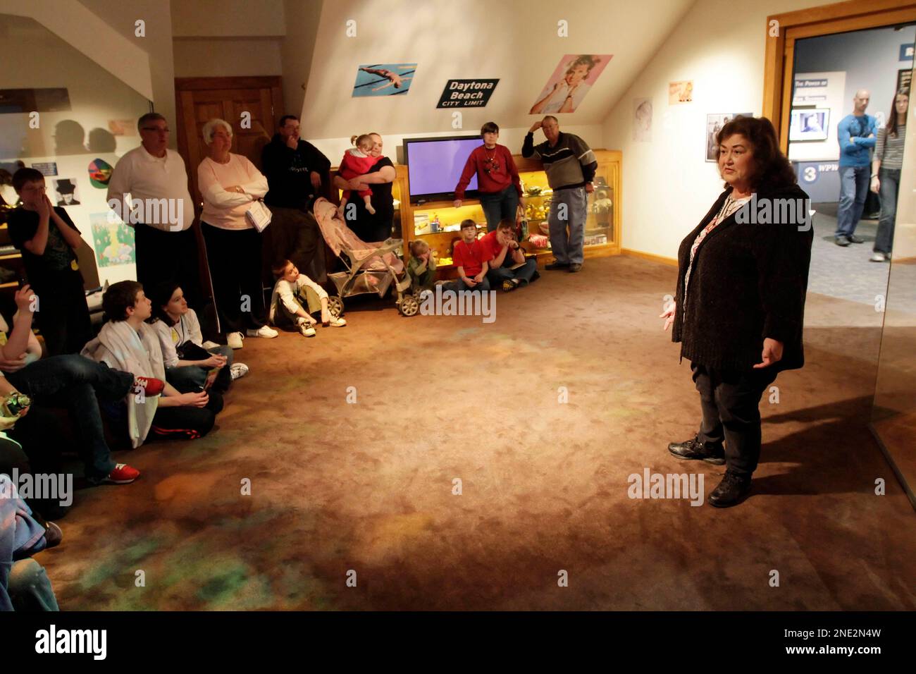 Jeanne White-Ginder, mother of Ryan White, talks to a group of people ...