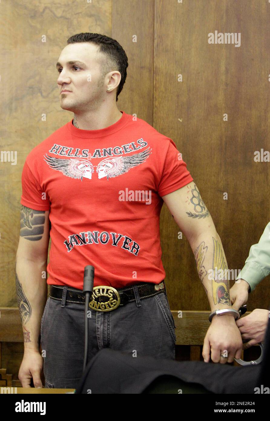Timur Akbulut of the rocker gang Hells Angels enters the courtroom of ...