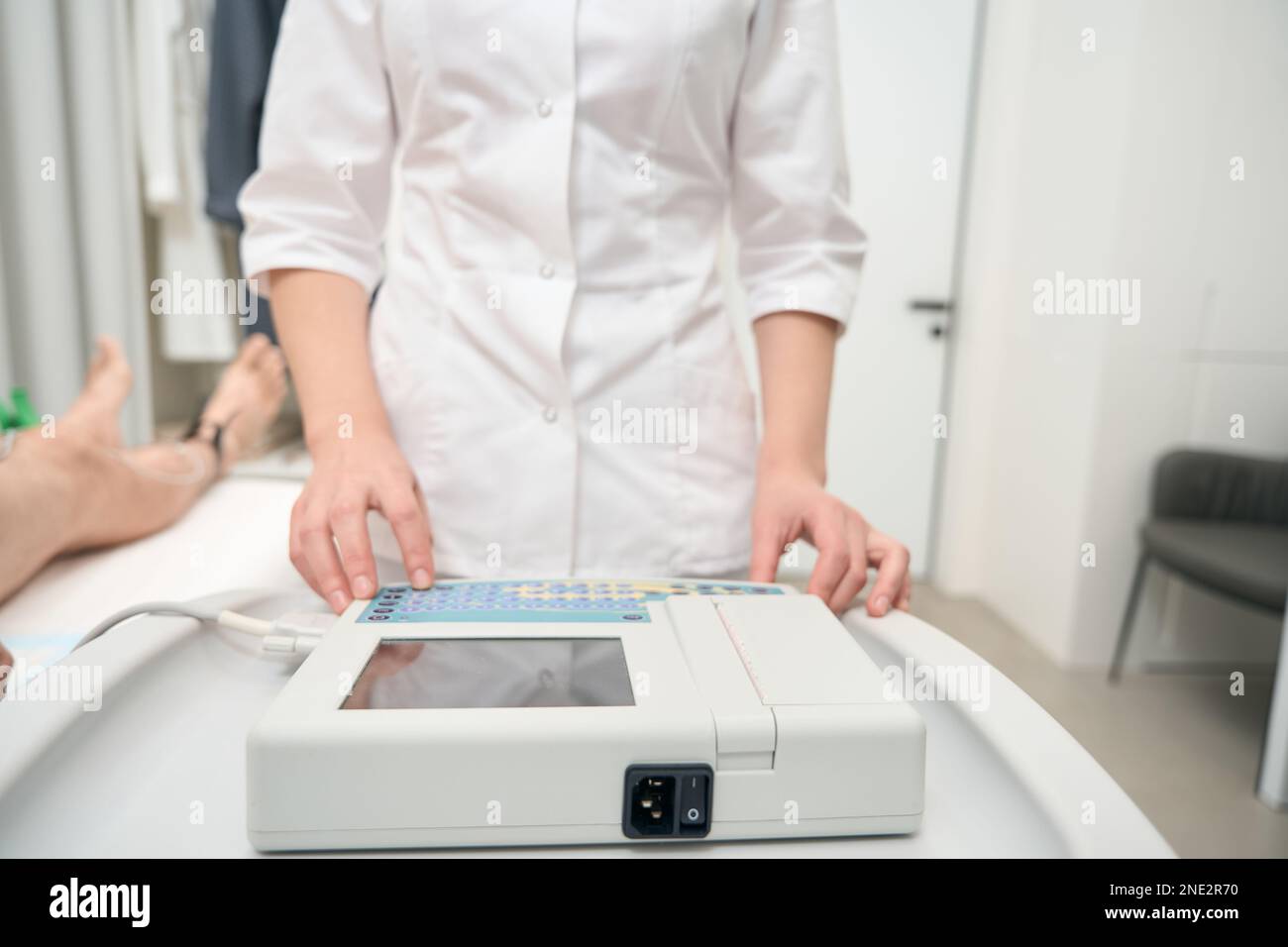 Medicine worker with cardiovascular equipments in medical office Stock ...