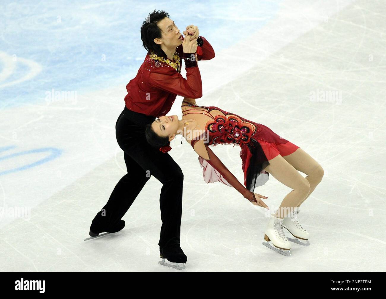 China's Pang Qing and Tong Jian perform during the pairs competition ...