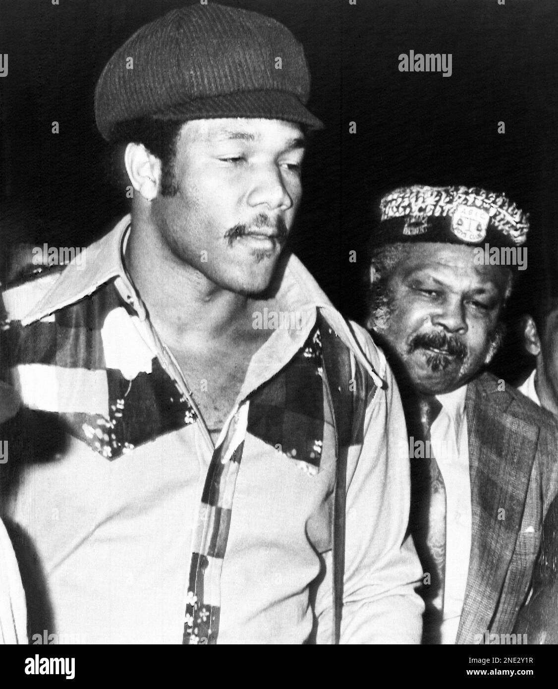 World heavyweight champion George Foreman, with former light ...