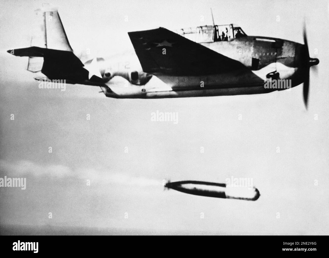 Leaving a trail of vapour behind it, a torpedo dropped by a U.S. navy ...
