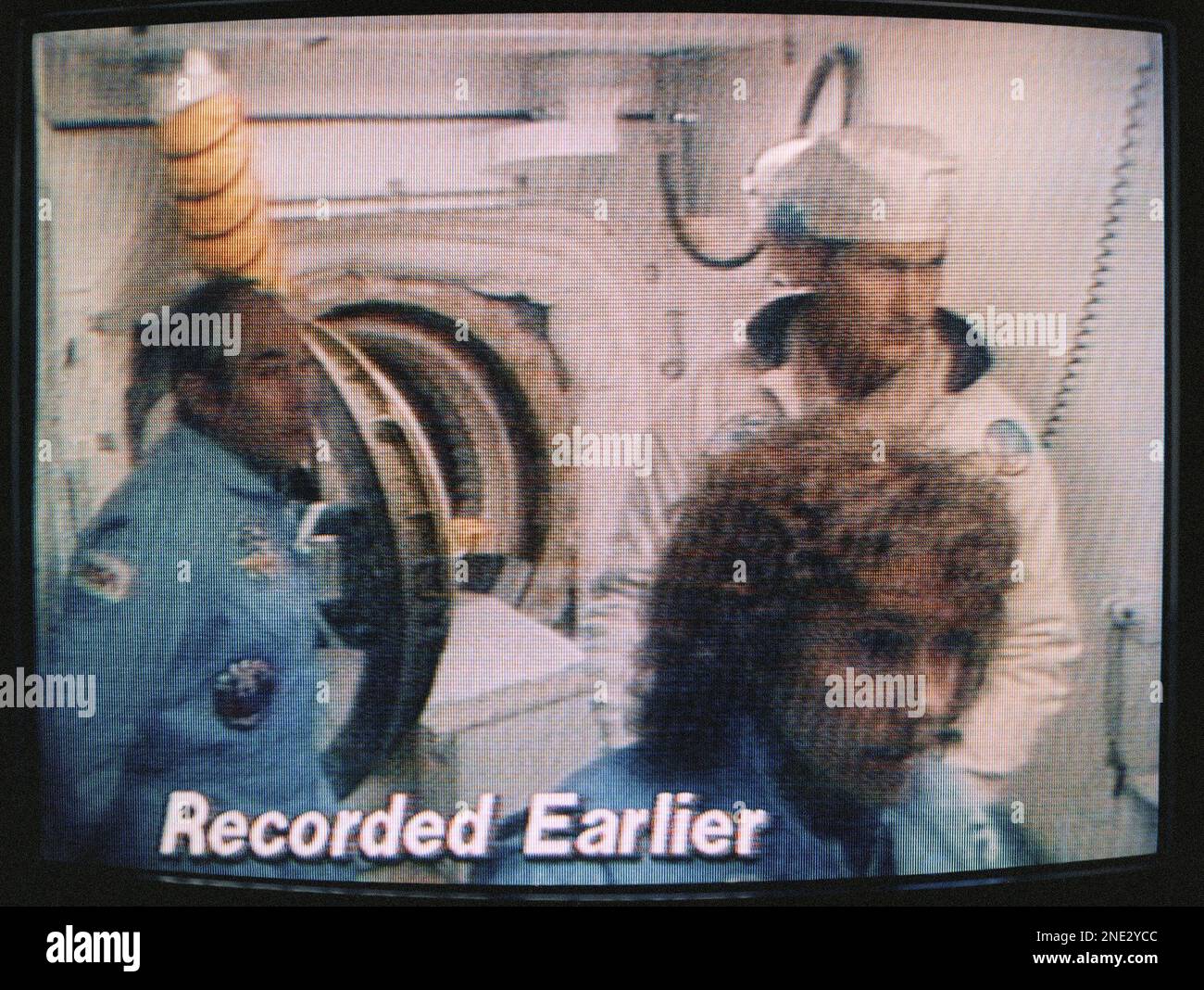 TV monitor shots of Space Shuttle Challenger Flight 51-L, crew, Jan. 28 ...