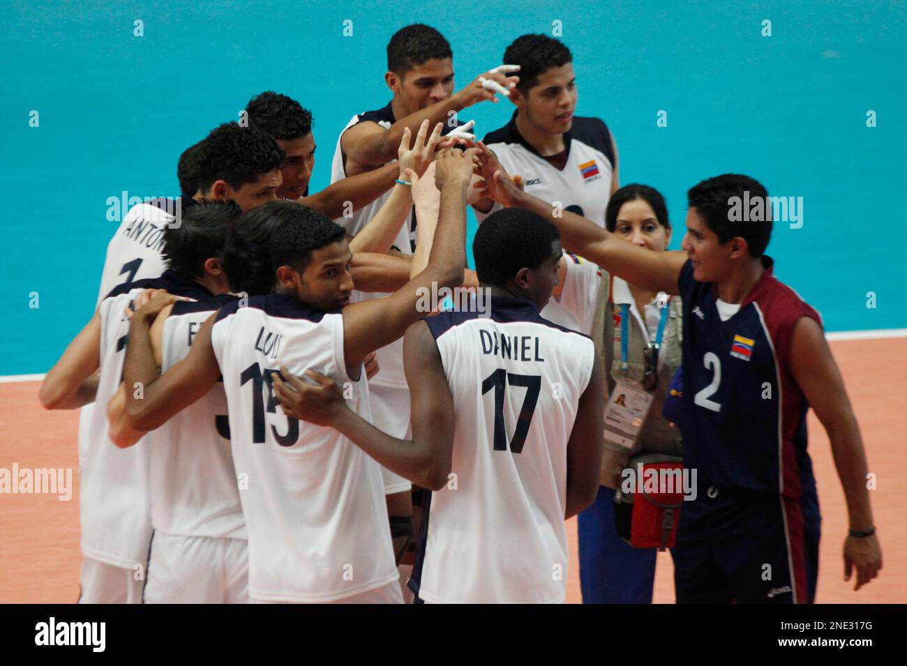 Venezuela's team celebrates at the end of a men's volleyball semi-final ...
