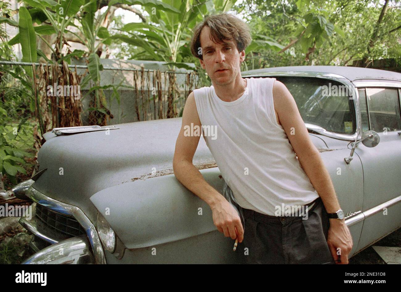 Alex Chilton poses outside his home in New Orleans on August 20, 1993 ...