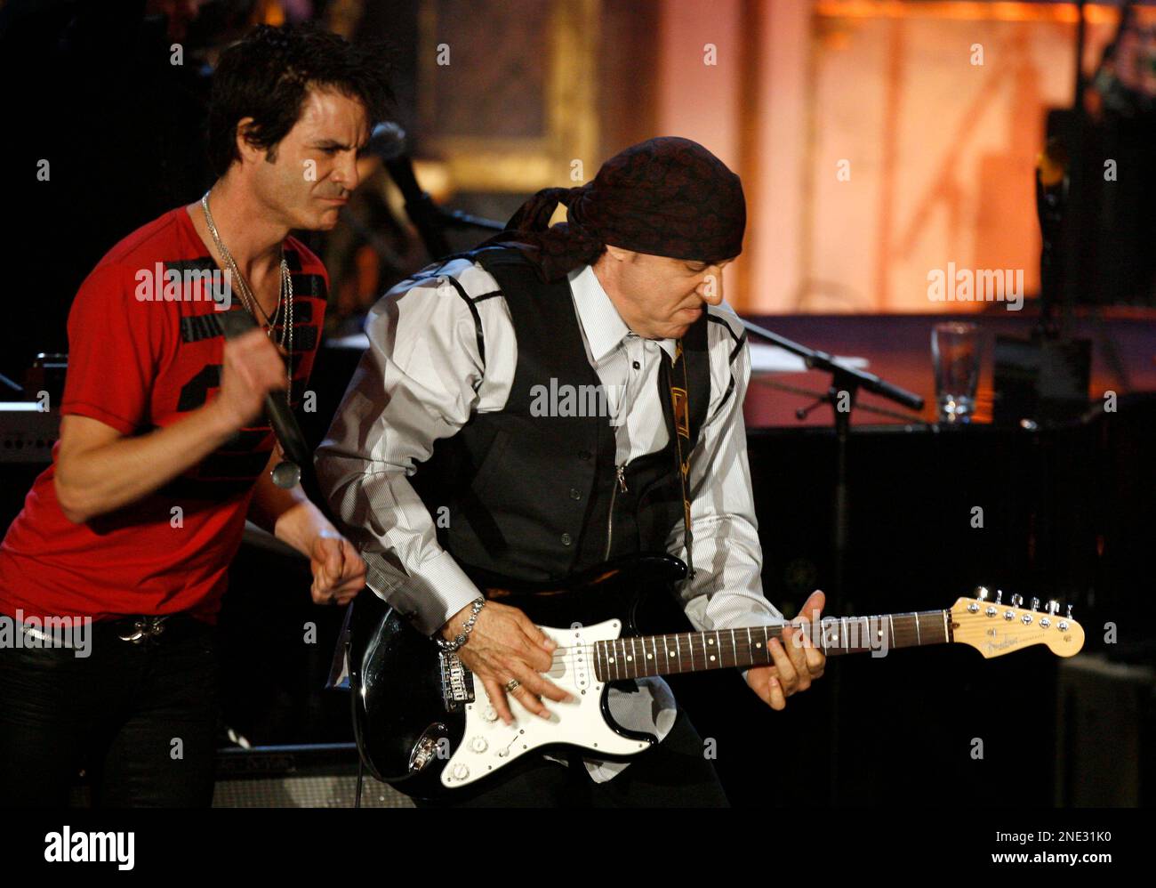 Pat Monahan, left, and Steven Van Zandt perform during the Rock and ...