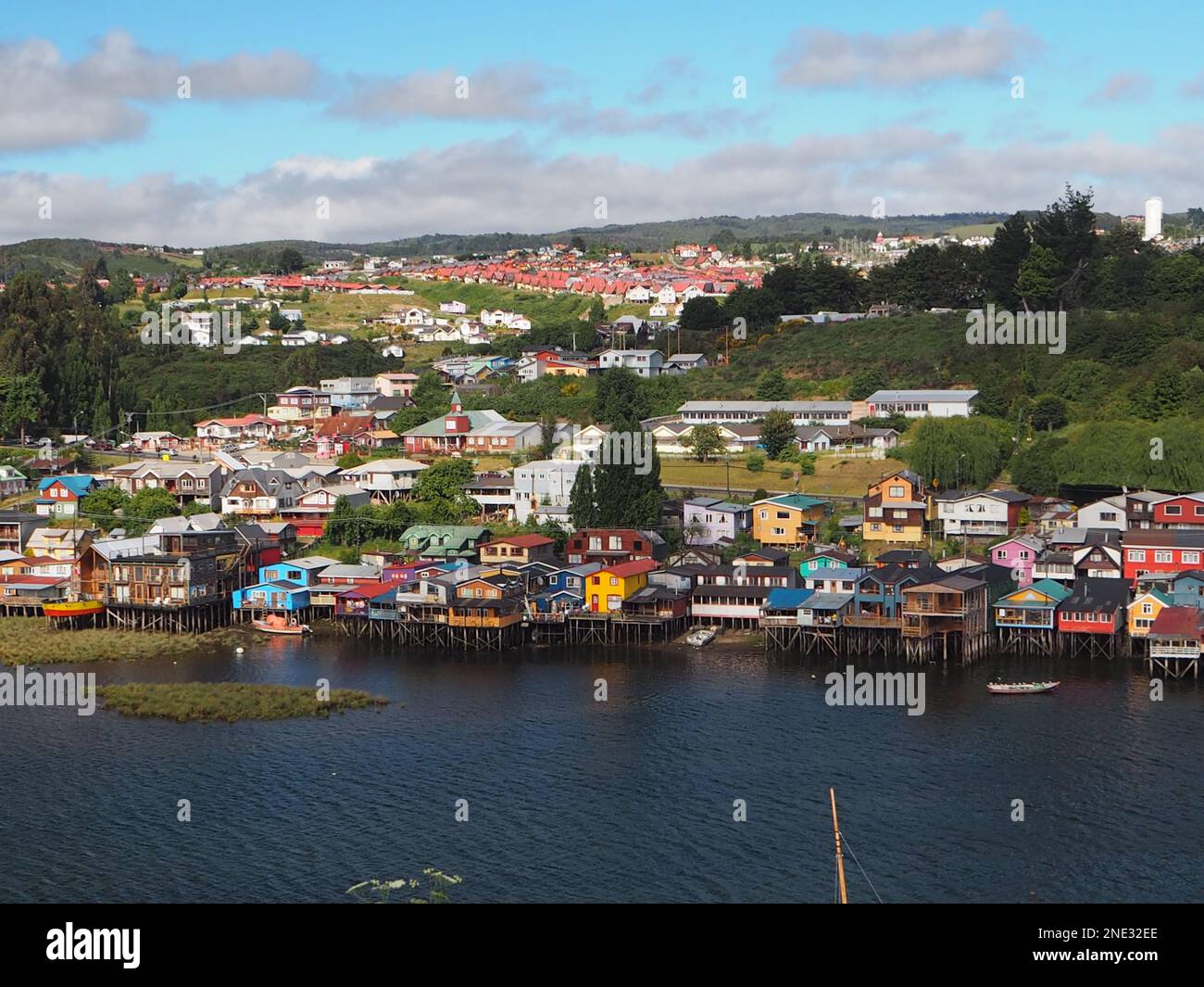 View looking down on the palafito houses at lake in Castro city, Chiloe ...