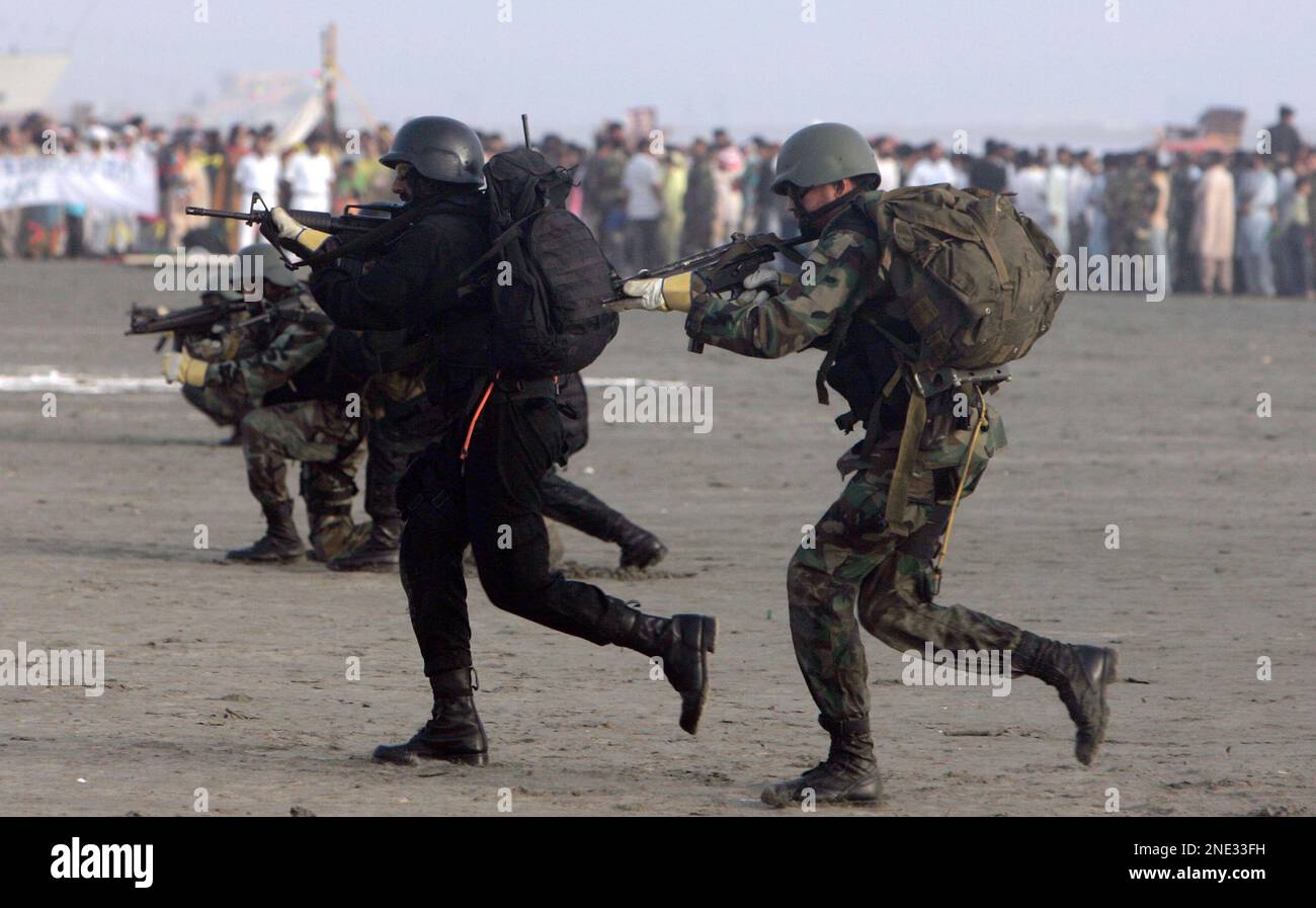 Pakistan Navy's commandos take part in an operation exercise during a ...