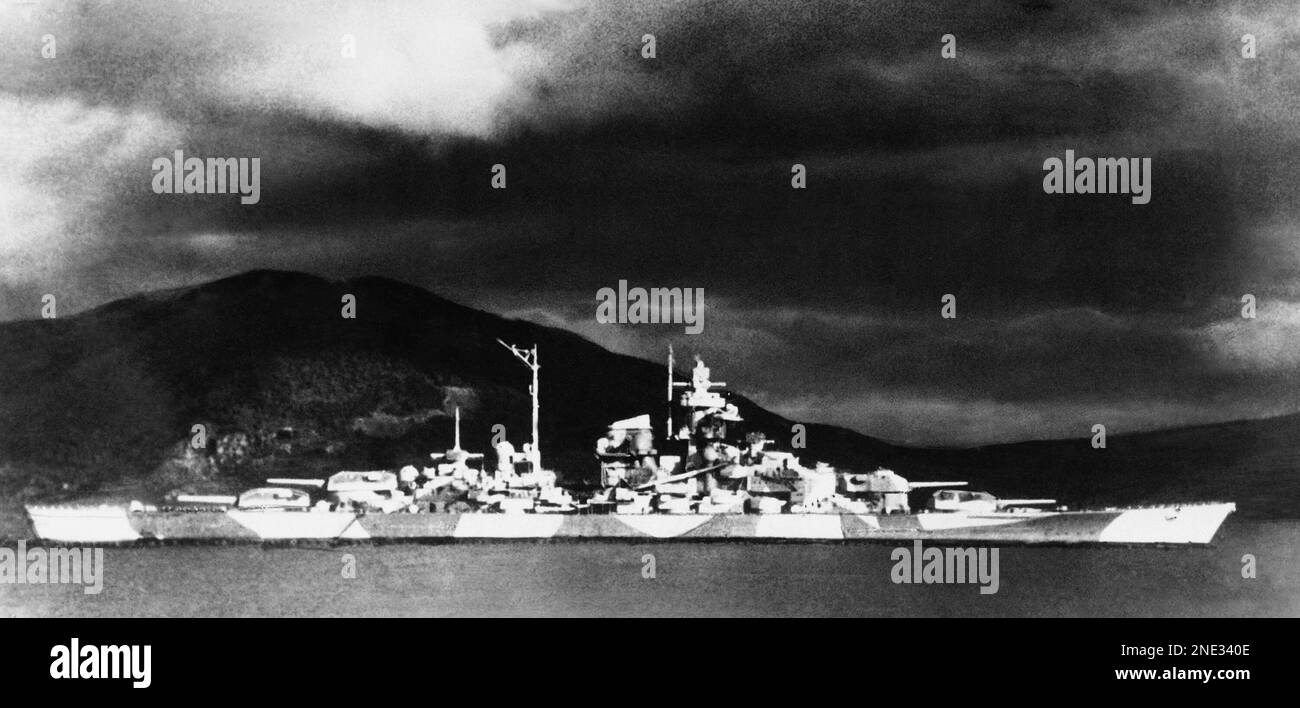The German battleship Tirpitz in her Norwegian hide-out up one of the ...