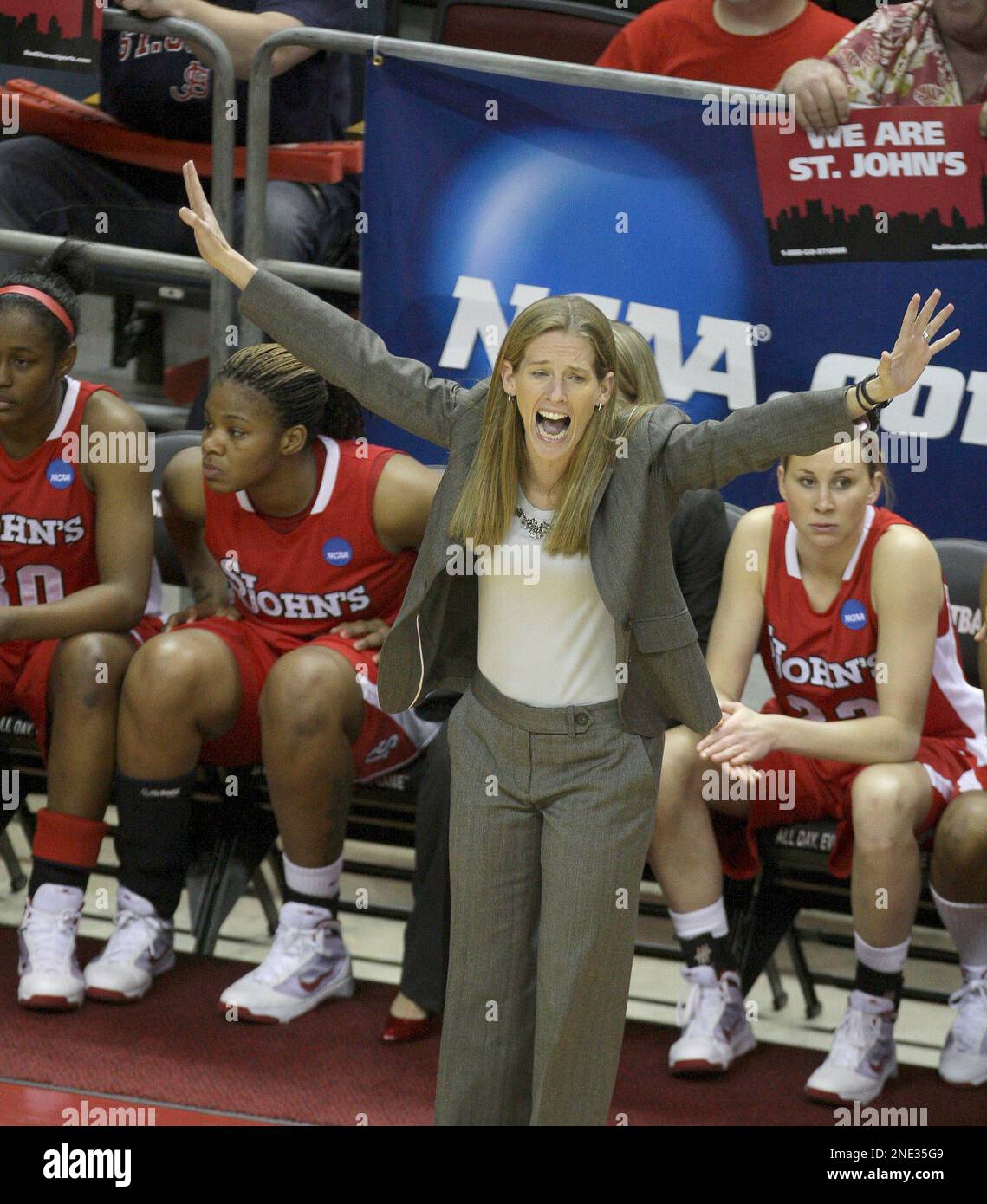St. John's head coach Kim Barnes Arico, center, during an NCAA college ...