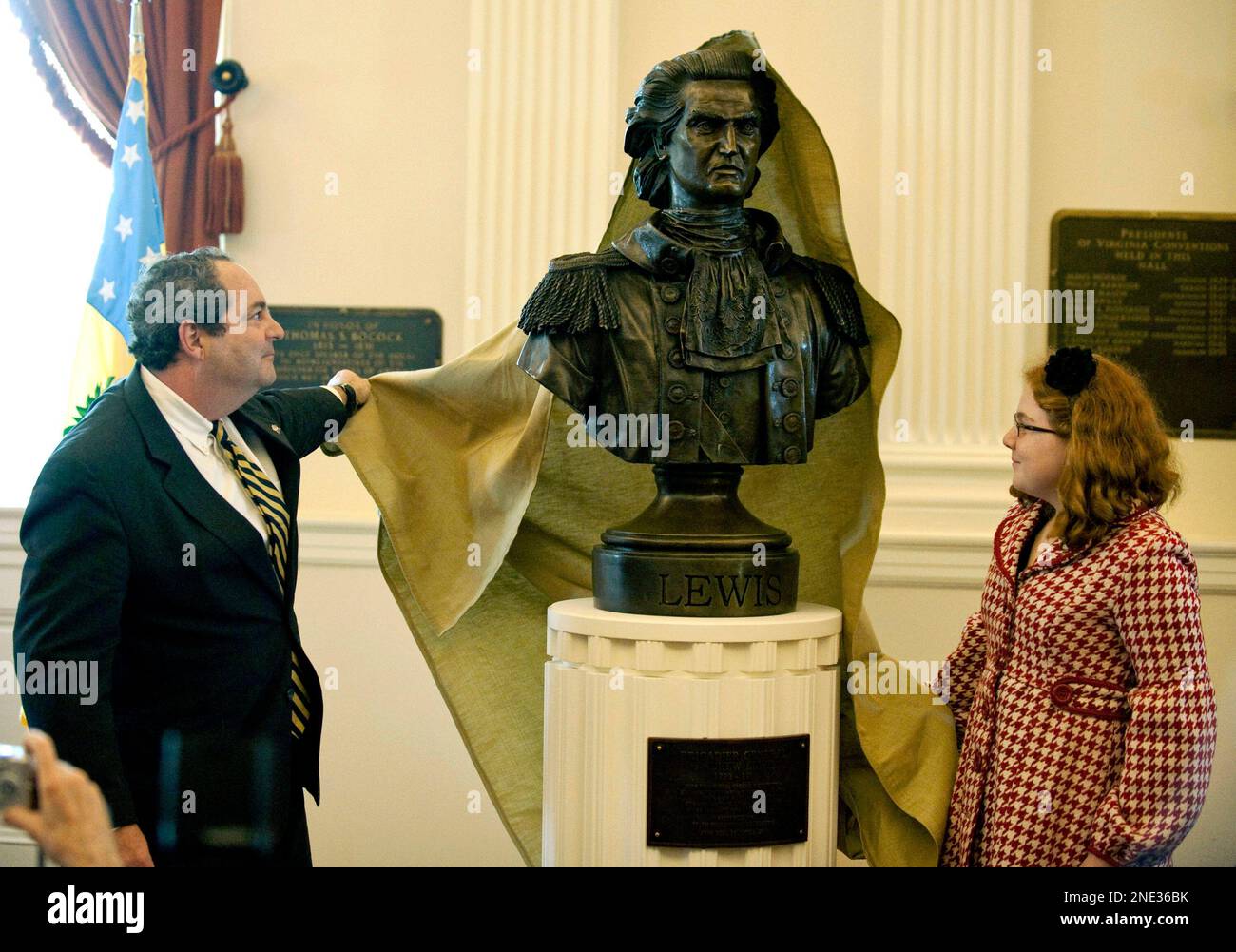 Lewis Pitzer, left, and his daughter Campbell unveil a bust of Andrew ...