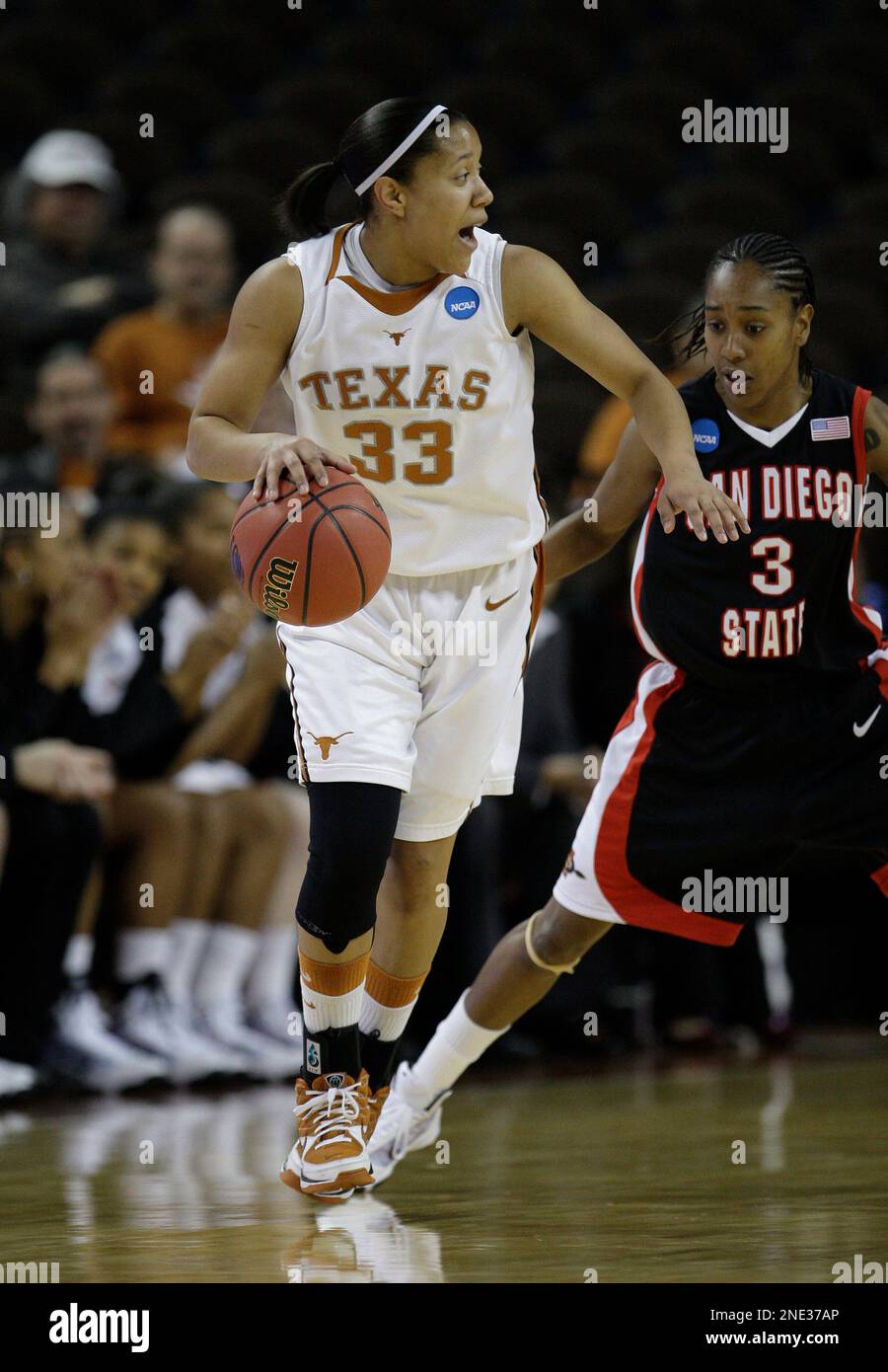 Texas' Ashleigh Fontenette is defended by San Diego State's Quenese ...