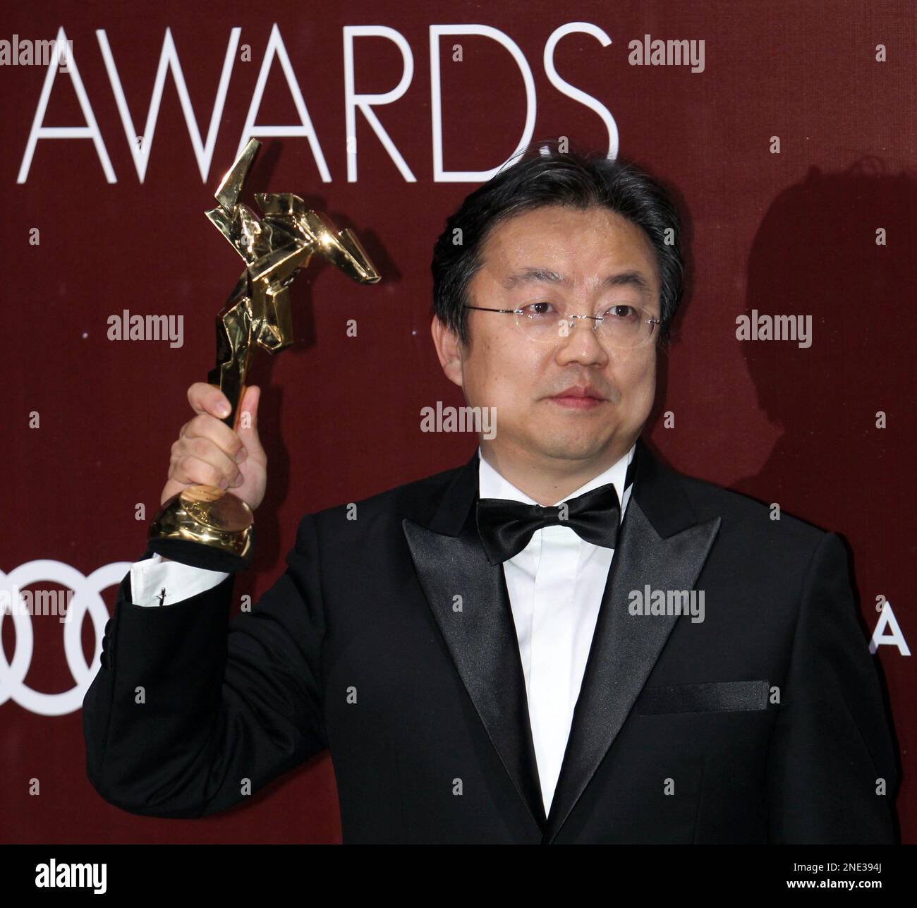 South Korea film producer Moon Yang-kwon celebrates after winning the ...