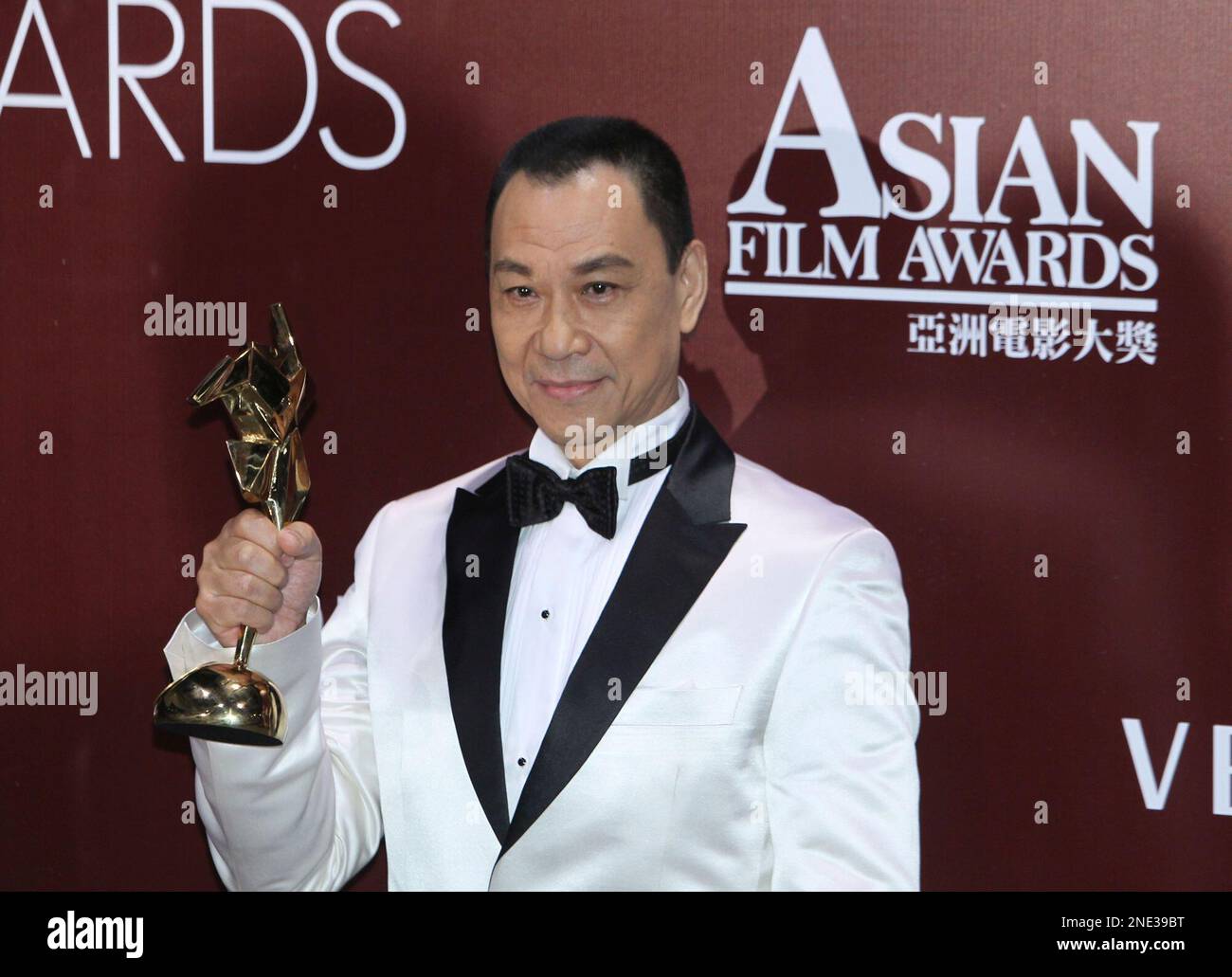 China actor Wang Xueqi celebrates after winning the best actor of his ...