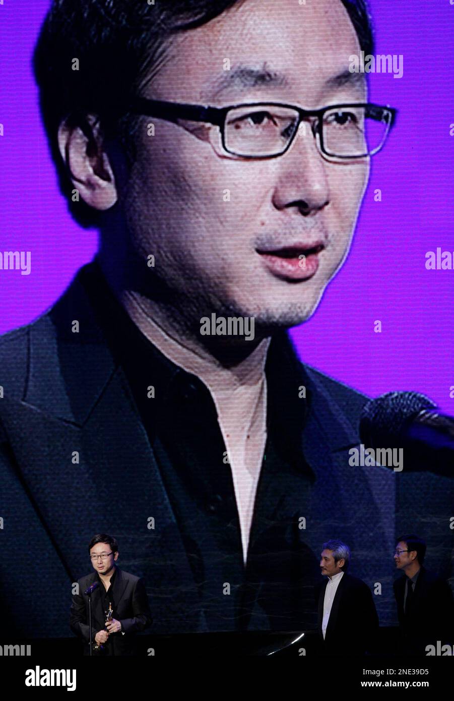 China's director Lu Chuan celebrates after winning the best director of ...