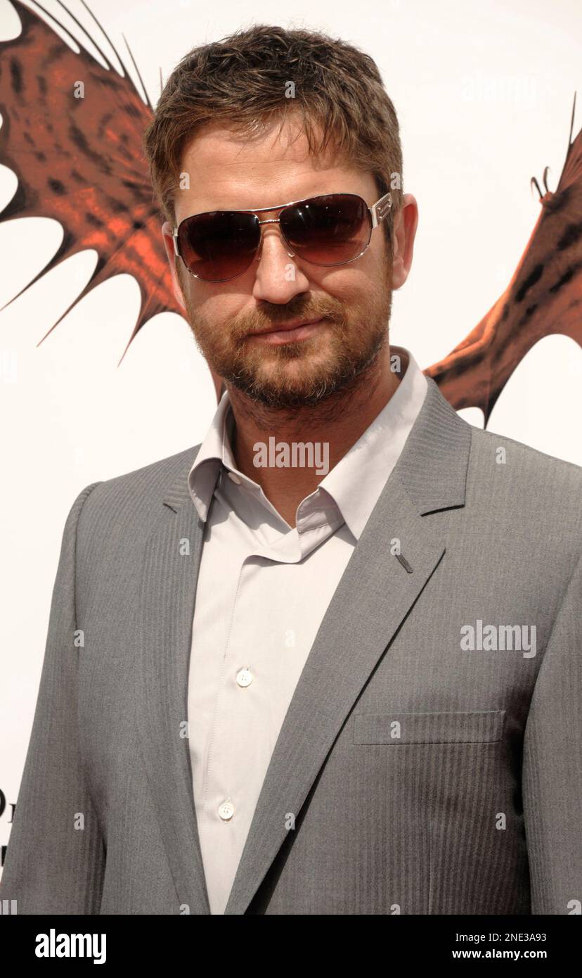 Actor Gerard Butler arrives at the premier of the feature film "How to ...