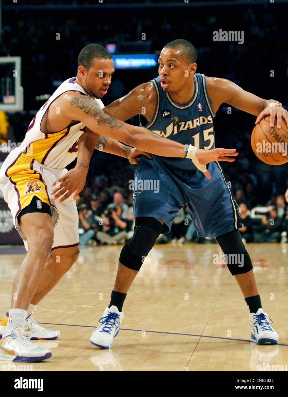 Washington Wizards guard Randy Foye (15) is guarded by Los Angeles ...