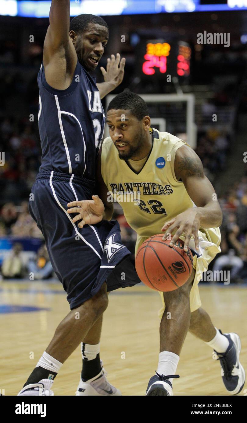 Pittsburgh's Brad Wanamaker (22) drives past Xavier's Dante Jackson in ...