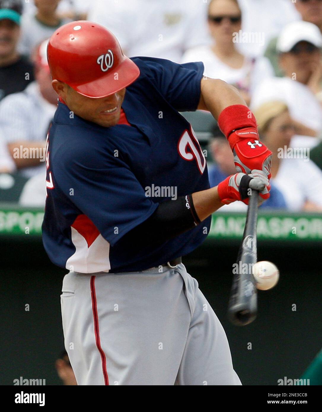 Washington Nationals catcher Ivan Rodriguez hits a single to lead off ...