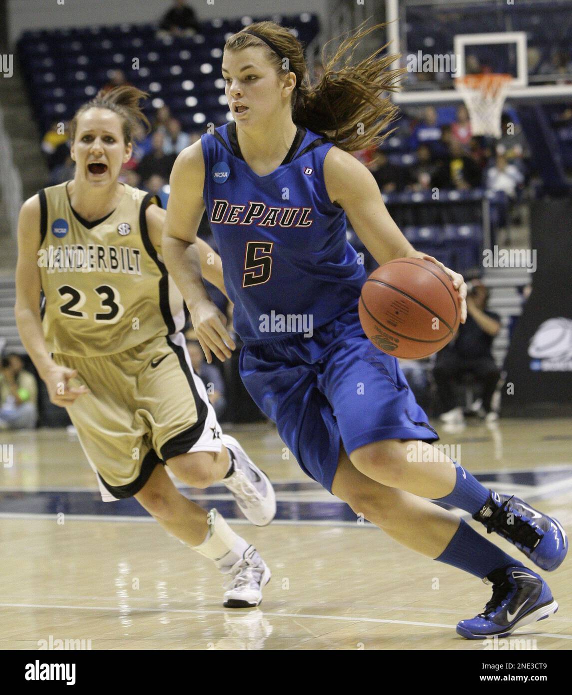 DePaul guard Anna Martin (5) drives past Vanderbilt guard Merideth ...
