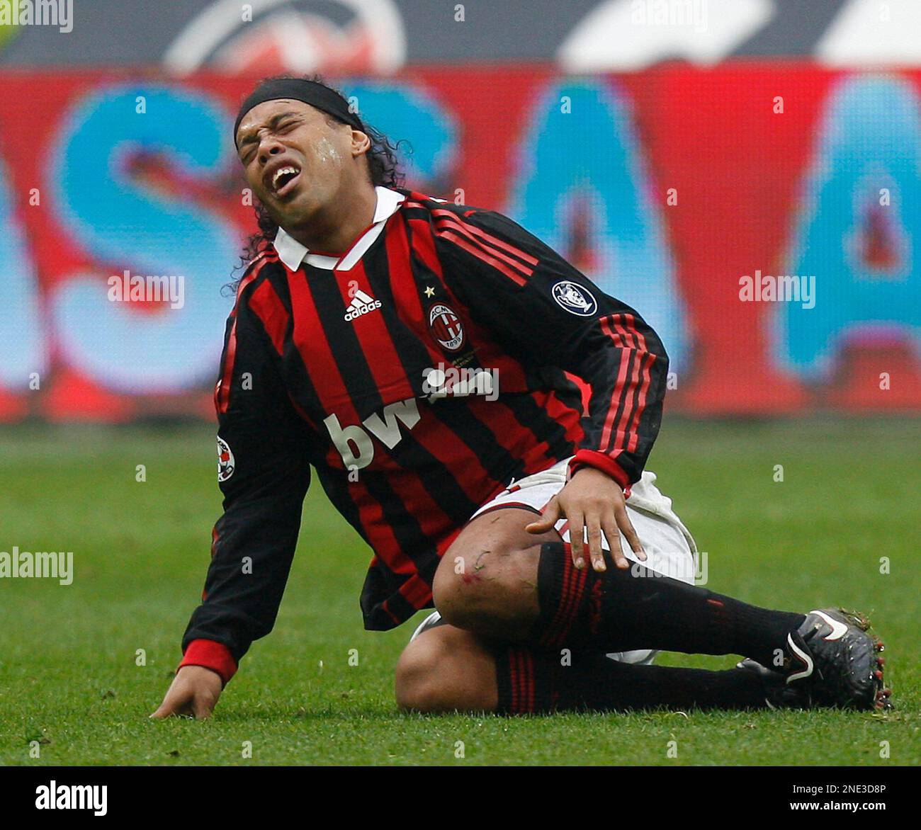 AC Milan Brazilian forward Ronaldinho reacts after being fouled during ...