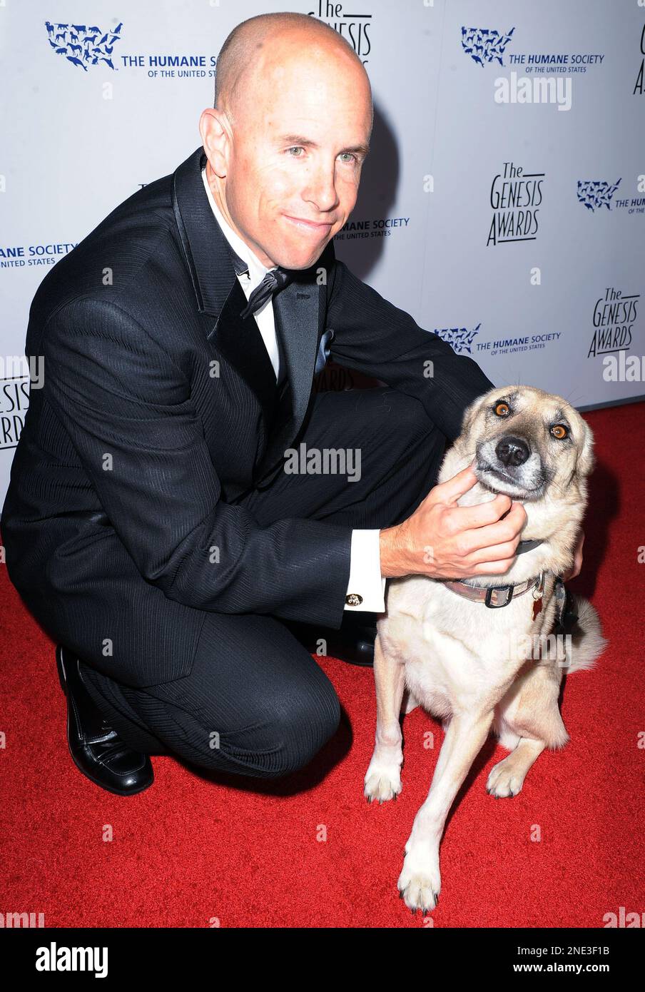 Major Brian Dennis and Nubs The Dog arrive at The 24th Genesis Awards ...