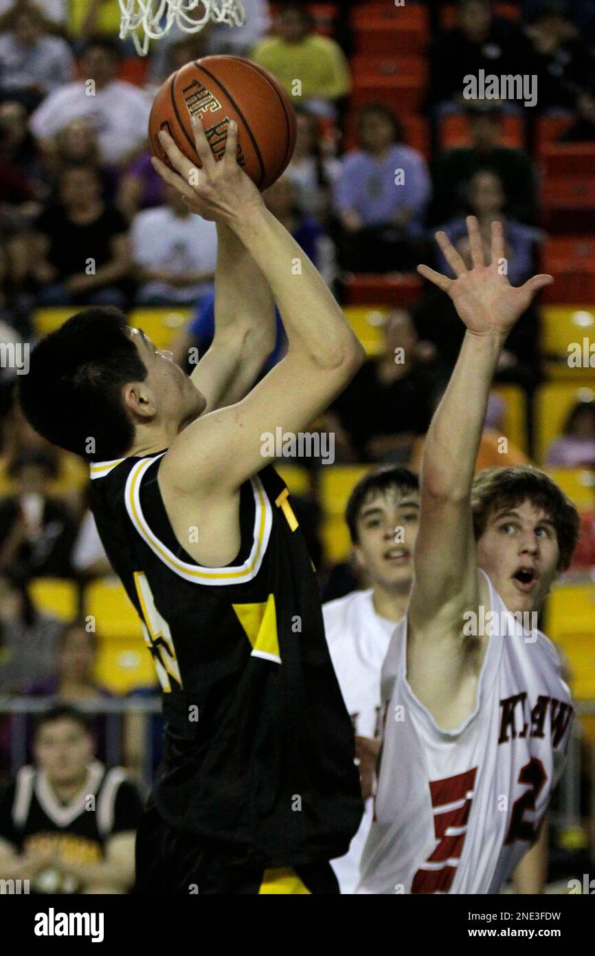 PT Hope player Zacharia Lane goes up for a two point shot against ...
