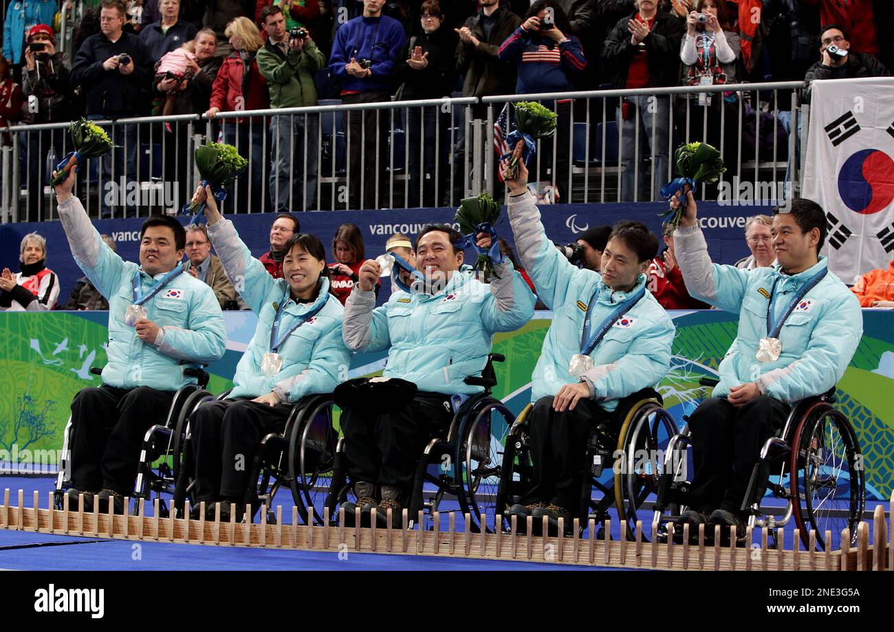 South Korea's Kil-Woo Park, left to right, Mi-Suk Kang, Yang-Hyun Cho ...