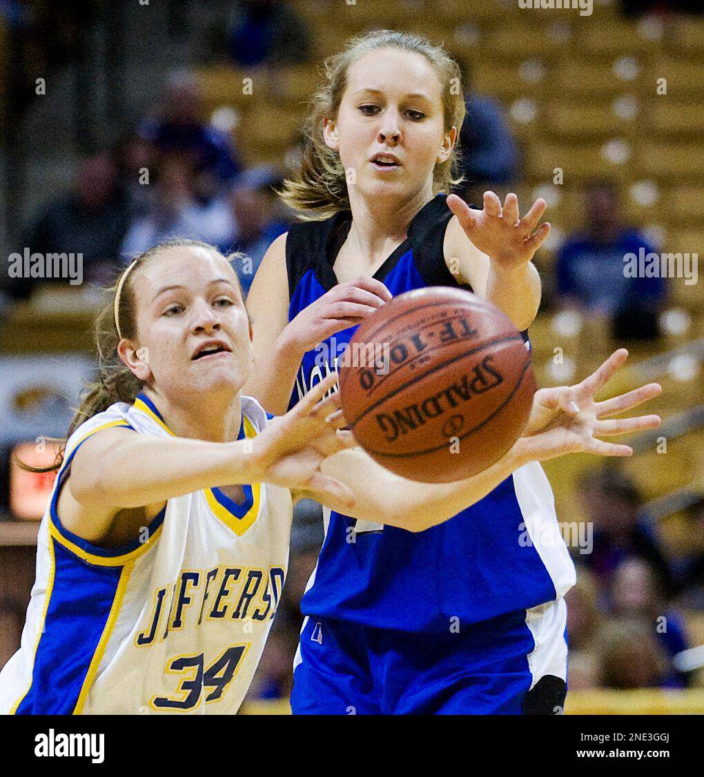 Jefferson's Kendle Schieber, left, and Montrose's Morgan Eye grab for a ...