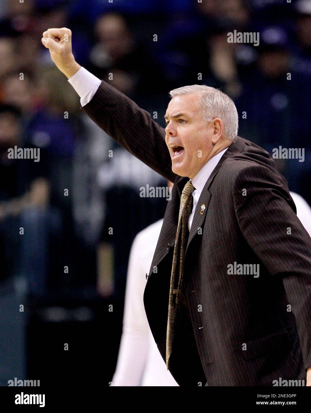 BYU head basketball coach Dave Rose yells from the sidelines during the ...