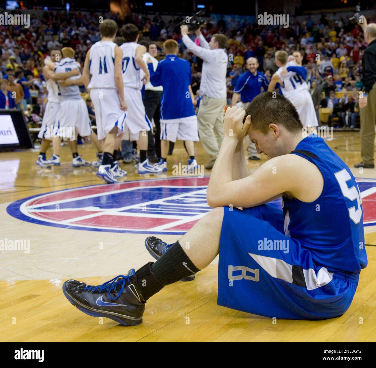 Bernie's Jeremy Walker cries on the court as Sturgeon celebrates in the ...