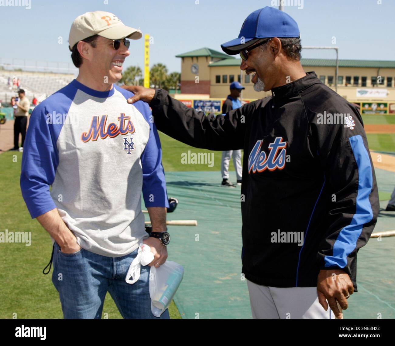 New York Mets manager Jerry Manuel, right, talks with Jerry Seinfeld ...
