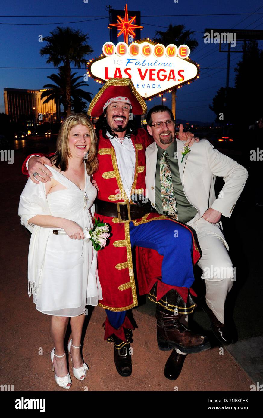 Captain Morgan and the Morganettes pose in front of the Welcome to Las ...
