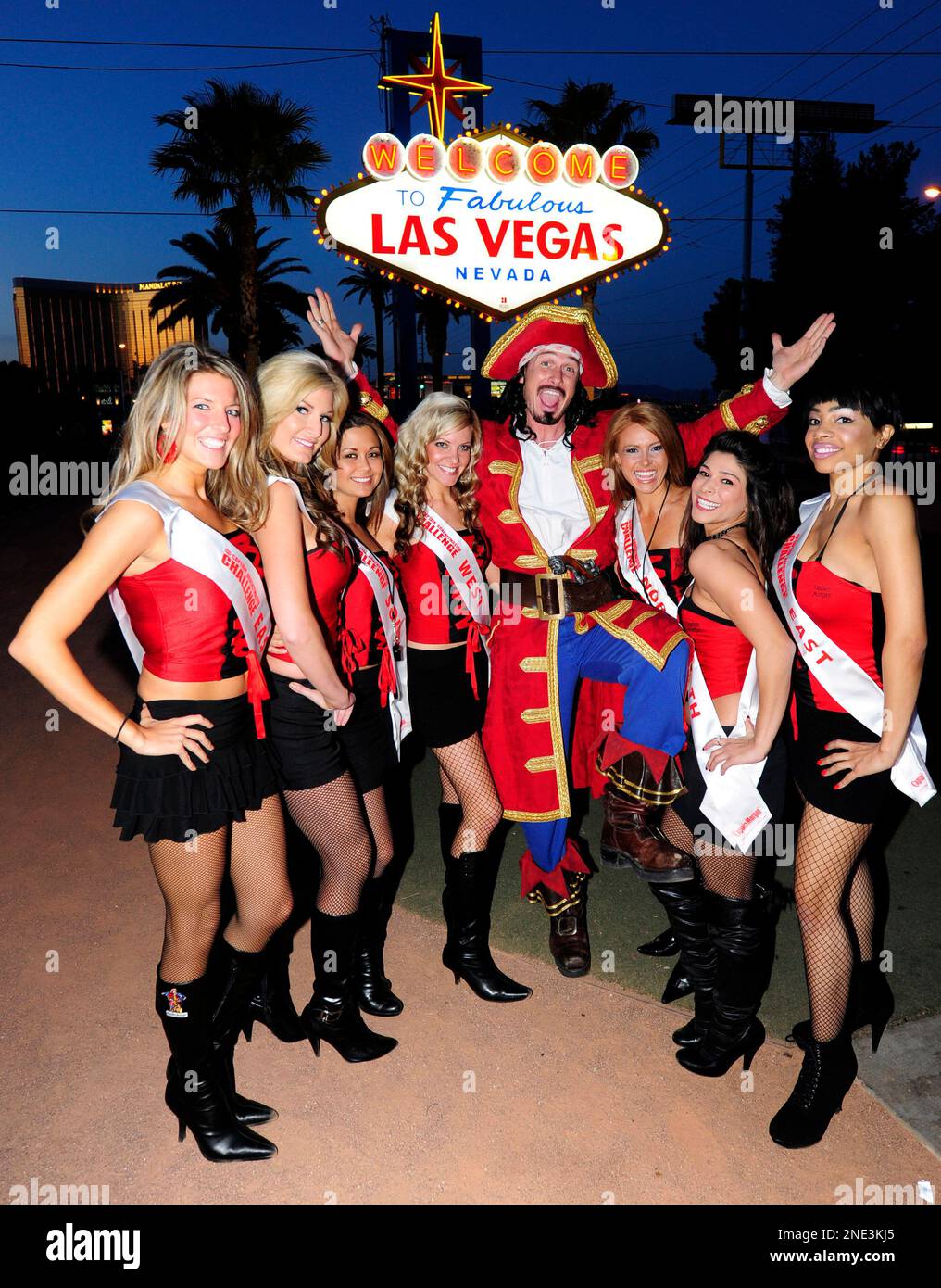 Captain Morgan and the Morganettes pose in front of the Welcome to Las ...