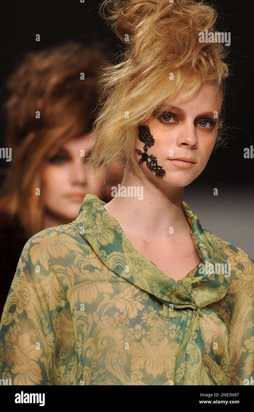 A model wears an outfit by Portuguese designer Ana Salazar during the ...