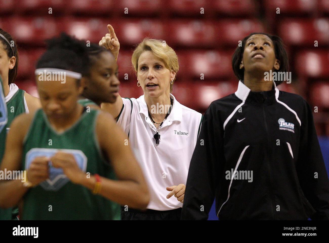 Tulane head coach Lisa Stockton, center, instructs her players ...