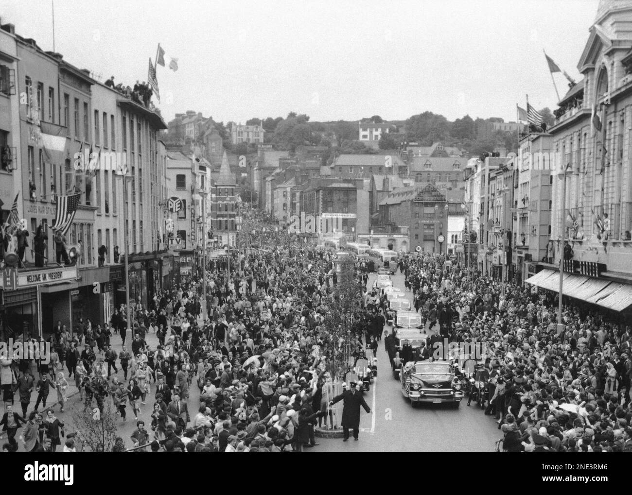 u.s. President John F. Kennedy is driven through St. Patrick Street, in ...