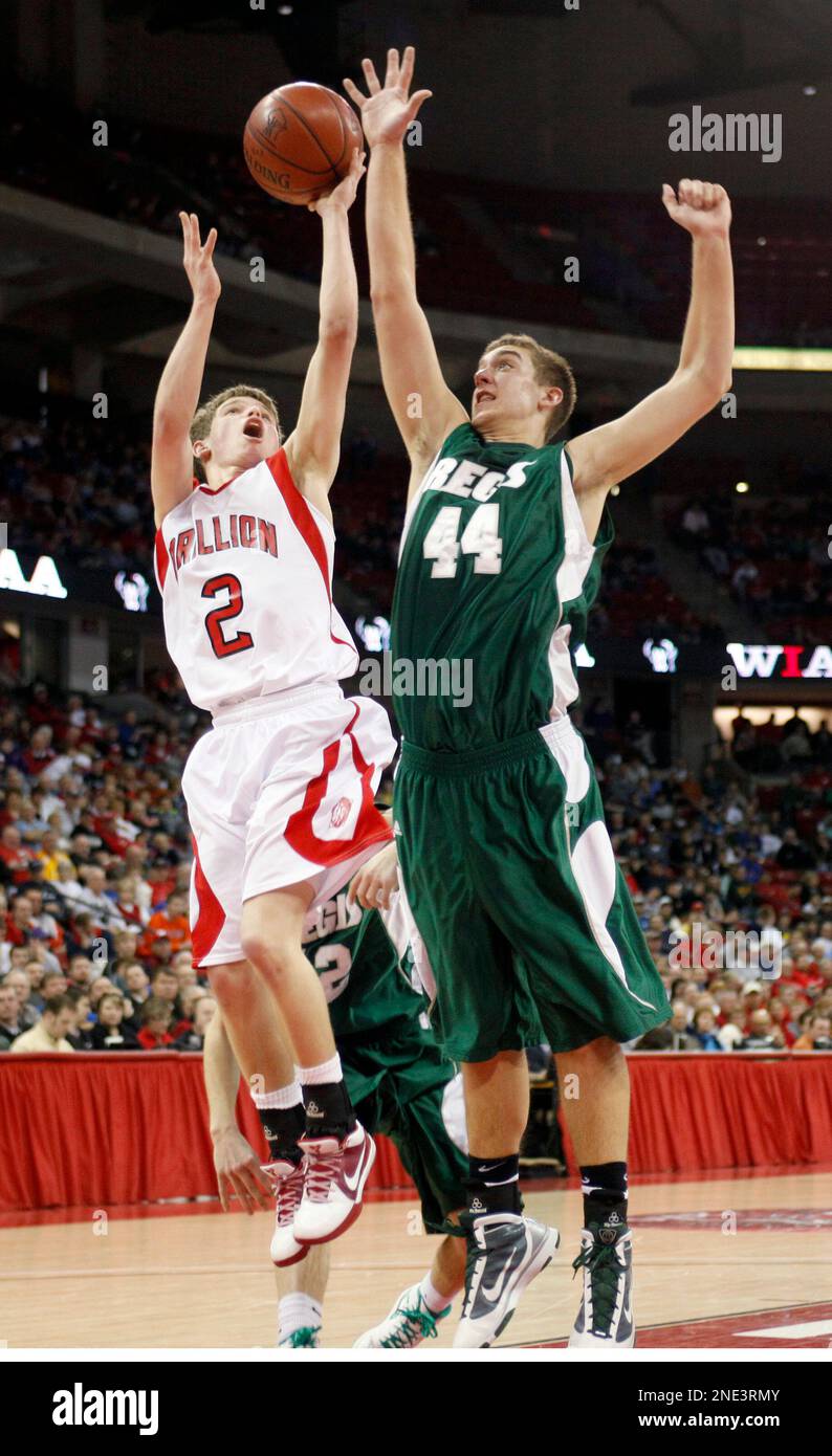 Brillion's Eric Kittel (2) shoots against Regis' Steven Hofacker during ...