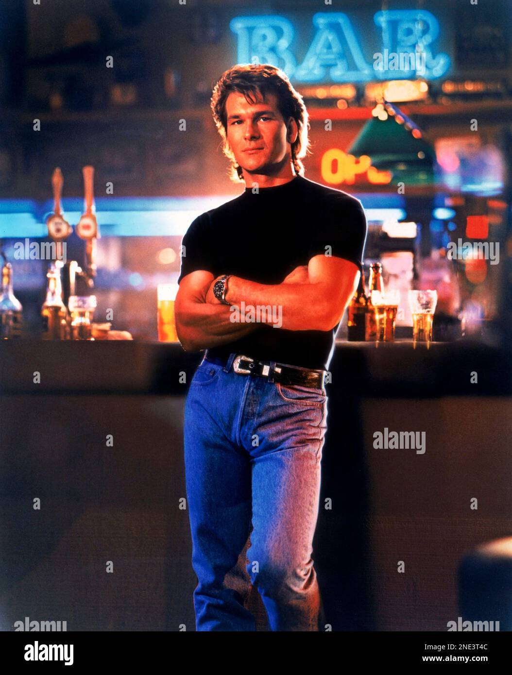 PATRICK SWAYZE in ROAD HOUSE (1989), directed by ROWDY HERRINGTON. Credit: M.G.M/UNITED ARTIST ...