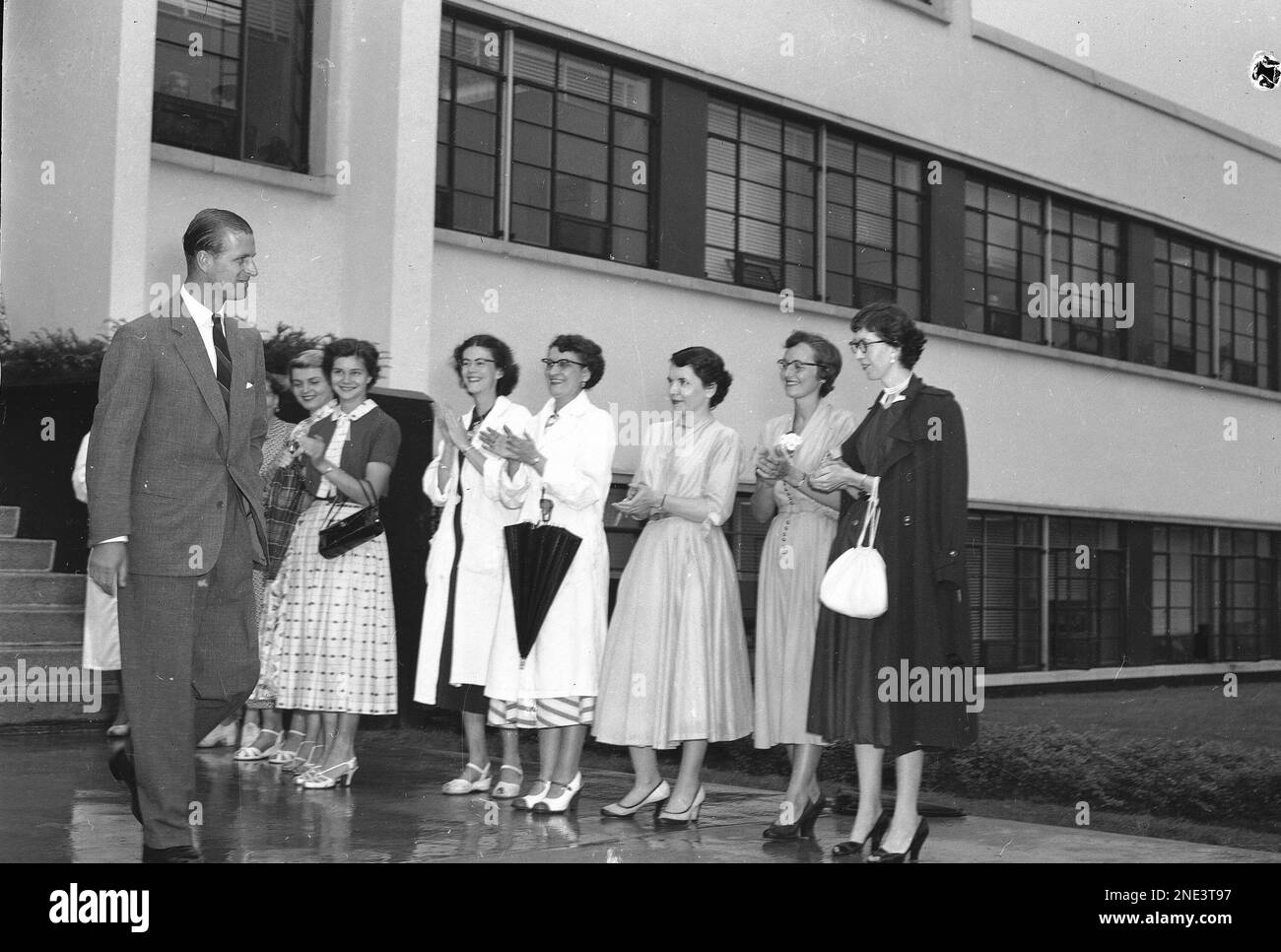 The ball and handsome Duke of Edinburgh is the center of feminine eyes ...