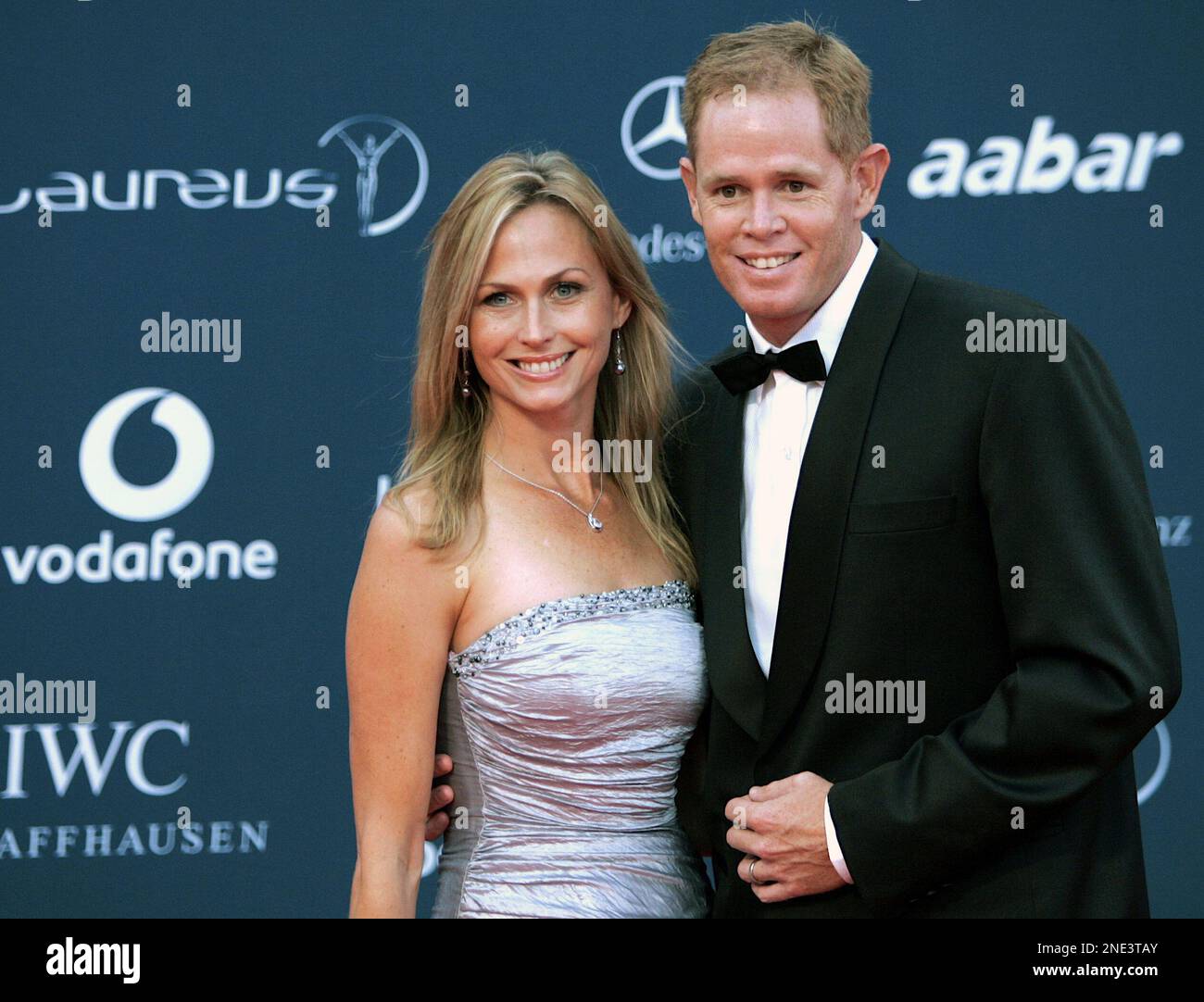 Former South African cricketer, Shaun Pollock, right and his wife ...