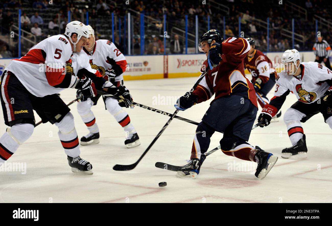 Atlanta Thrashers center Rich Peverley takes a shot through Ottawa ...