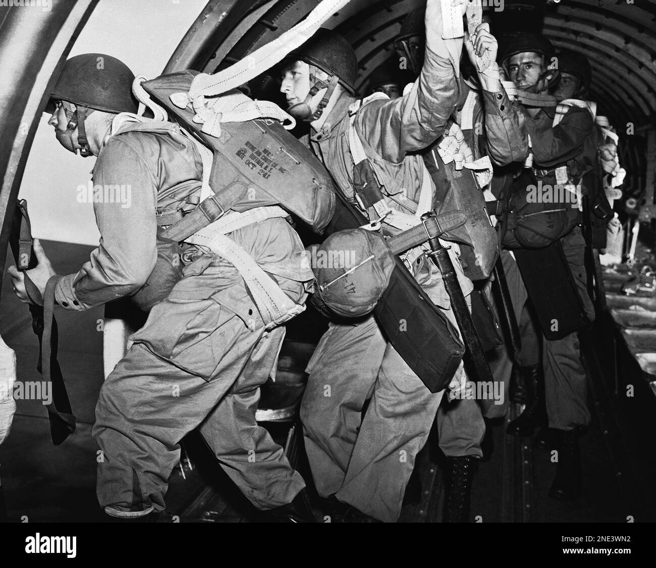 The group commander gets ready to lead his men in a practice jump as ...