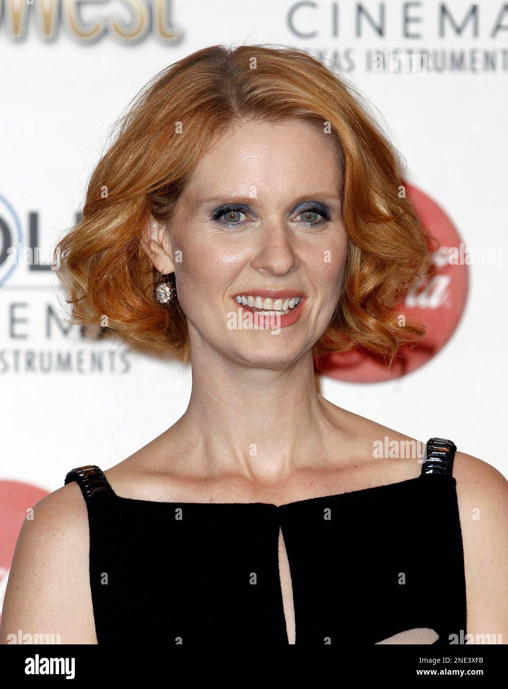 Actress Cynthia Nixon poses for photographers backstage at the ShoWest ...