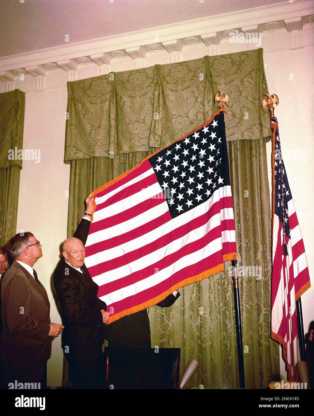 Dwight D. Eisenhower shown with others in ceremony making Alaska the ...