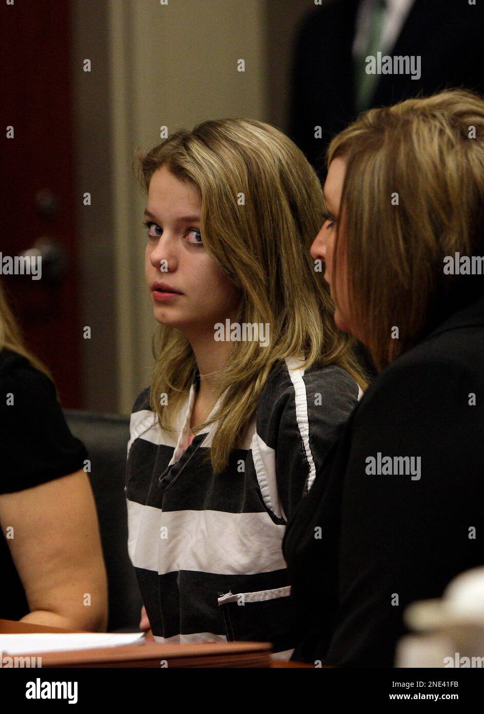 Elizabeth Johnson, left, mother of missing baby Gabriel, sits next to ...